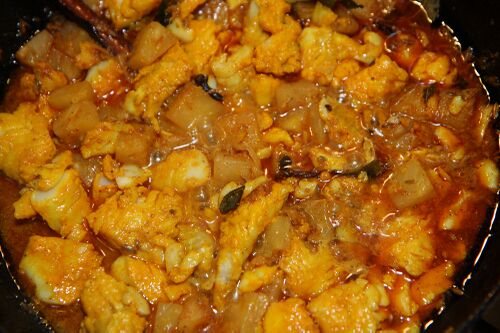 Spicy basa fish fillets with pineapple an Indian recipe