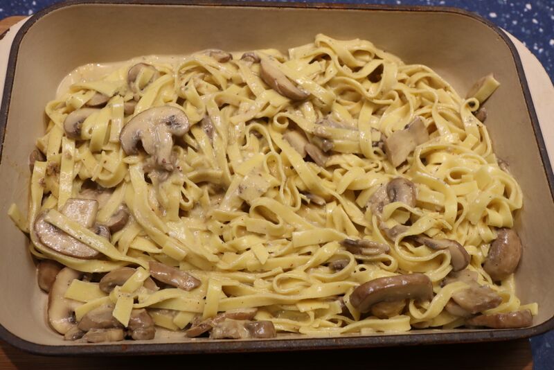 Baked ribbon pasta with stilton, mushrooms and mozzarella cheeses ready ...